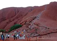 Tourists sometimes violate the rules and climb the top