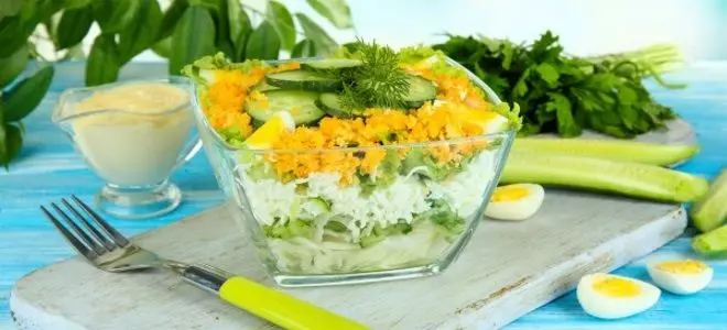 Salad with cabbage and cucumber with the addition of peas, carrots, eggs, sausages, peppers and other ingredients 29850_5