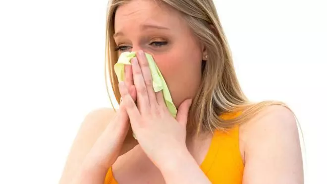 Application of hands during sneezing