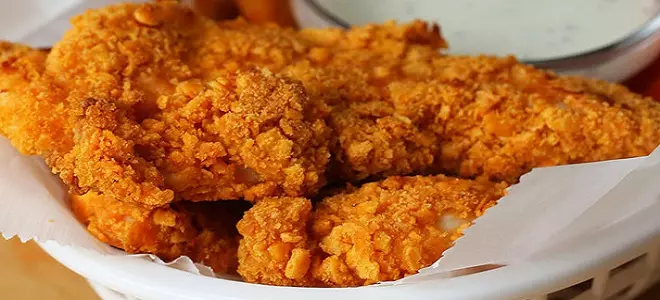 Nuggets in de golfluizen in de oven